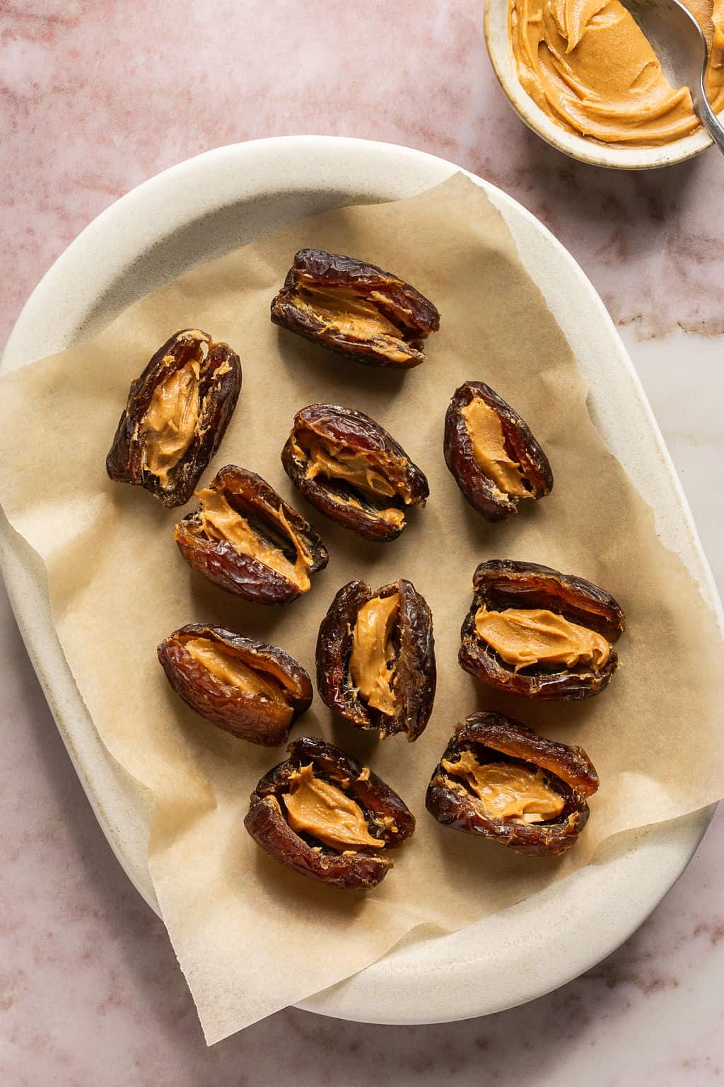 Date Snickers (Chocolate Covered Peanut Butter Stuffed Dates) | Lauren ...