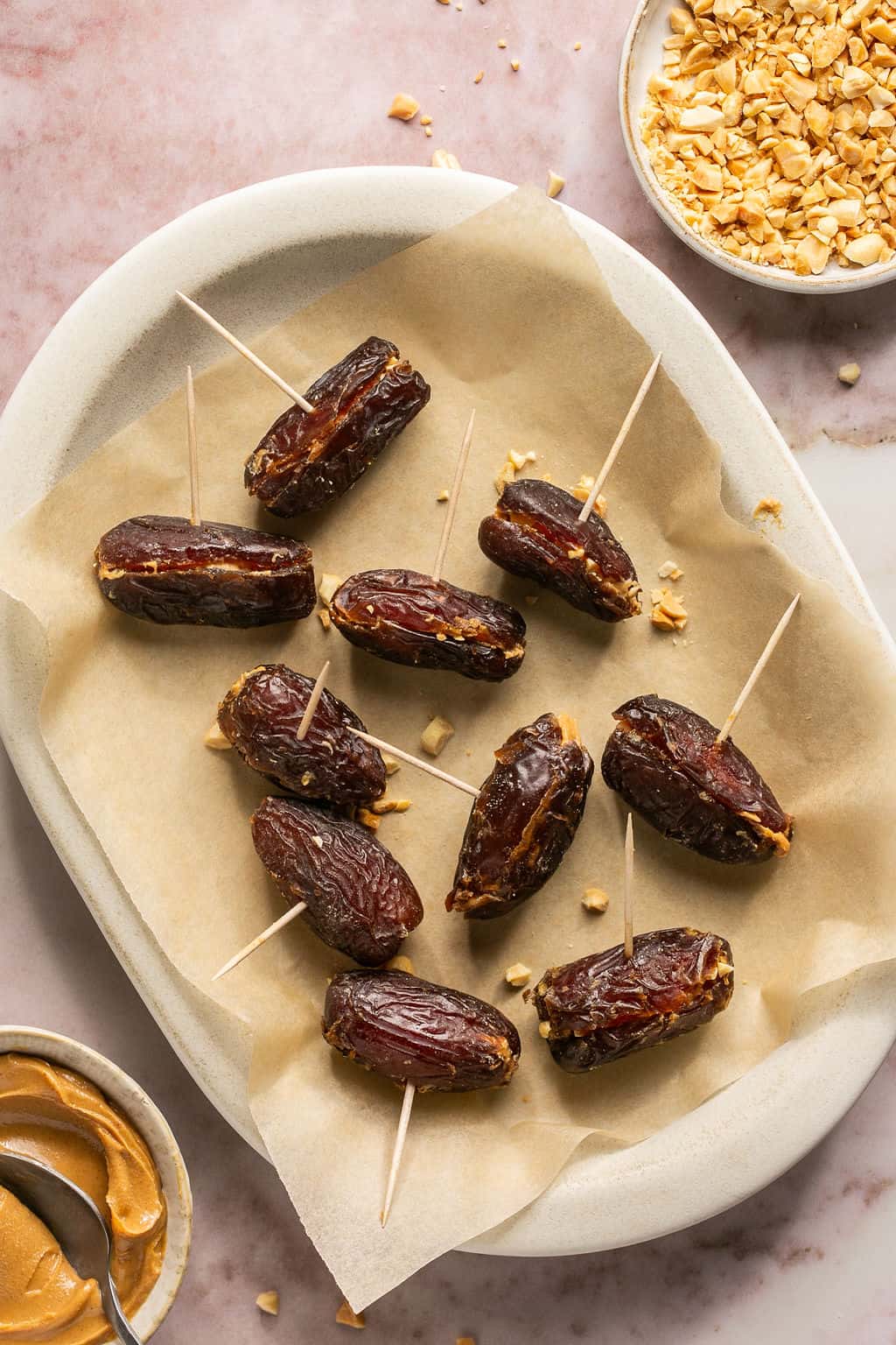 Date Snickers (Chocolate Covered Peanut Butter Stuffed Dates) | Lauren ...